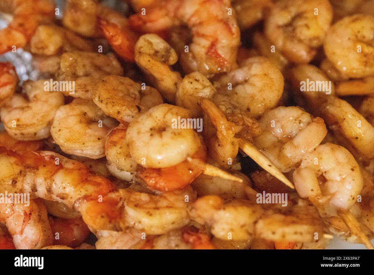 Bunch of Shrimp Skewers for a party Stock Photo - Alamy