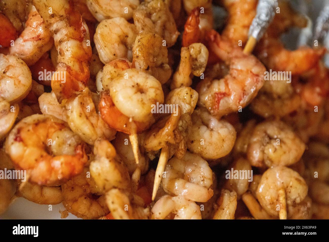 Bunch of Shrimp Skewers for a party Stock Photo - Alamy