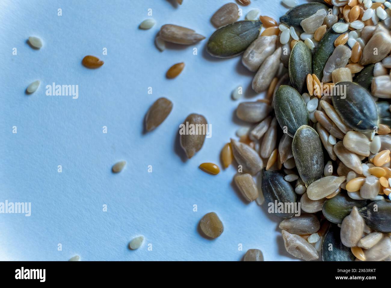 Mixed seeds pile isolated sunflower hi-res stock photography and images ...