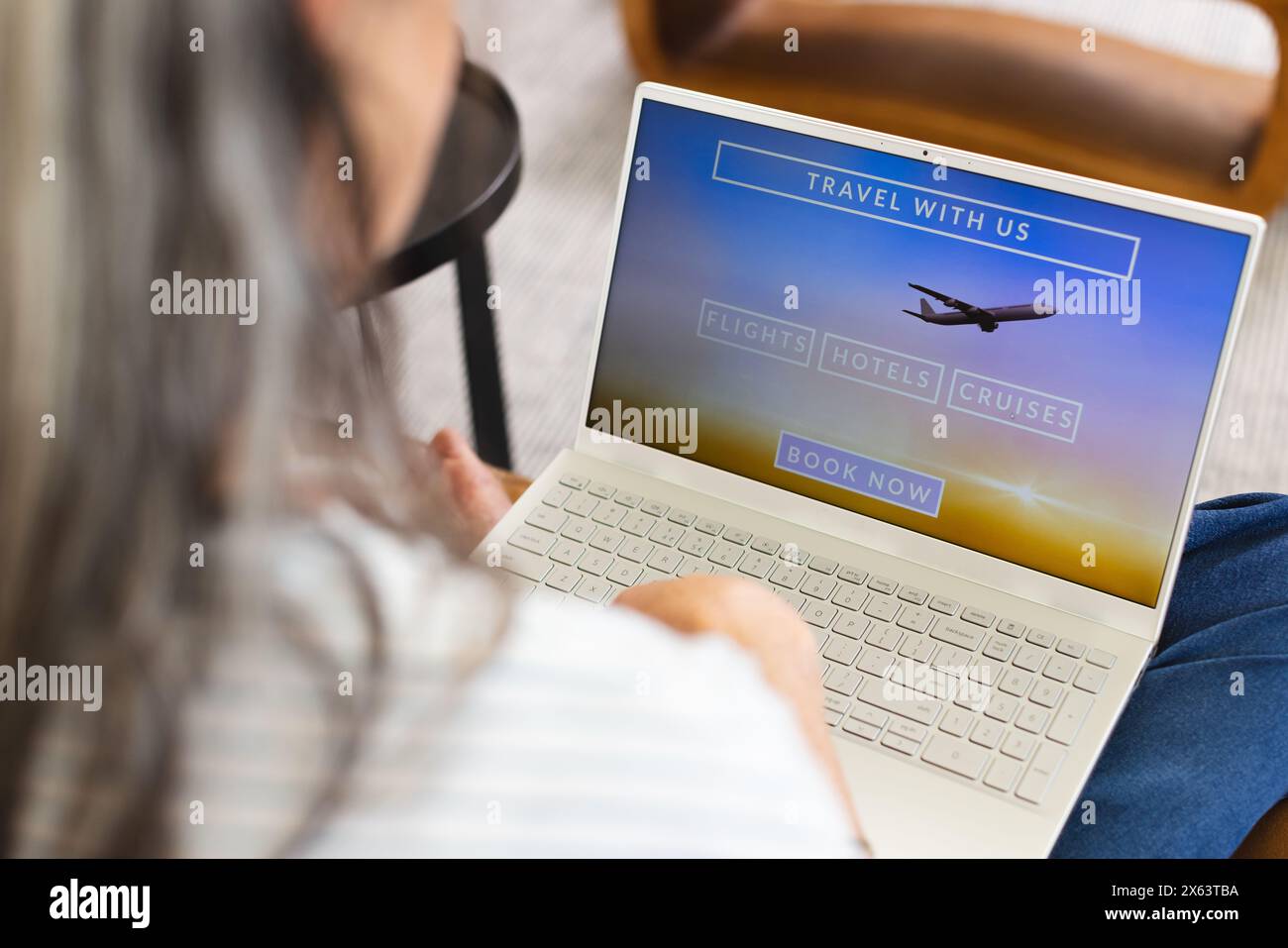 At home, mature Caucasian woman examining laptop screen Stock Photo - Alamy