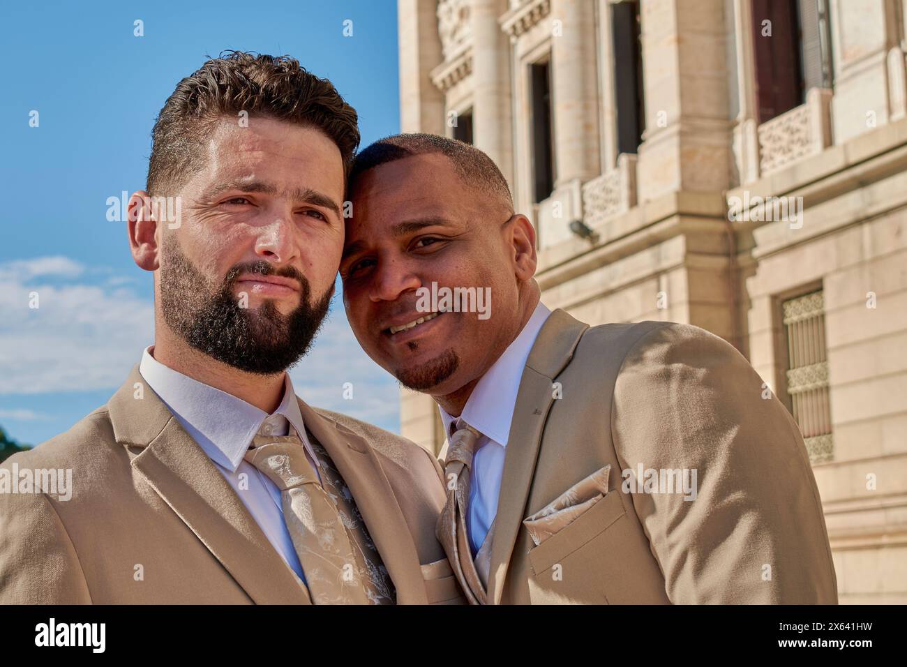 Two lovers smiling at camera, LGBT couple celebrating their marriage ...