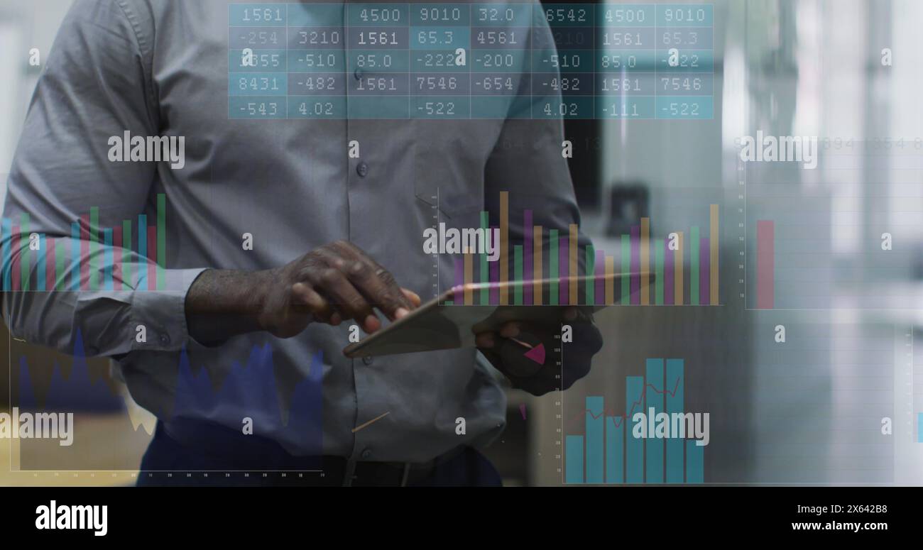 Image of graphs and number charts, senior african american man ...