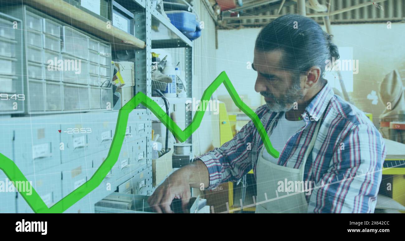 Image of green graph processing over mature caucasian male carpenter in ...