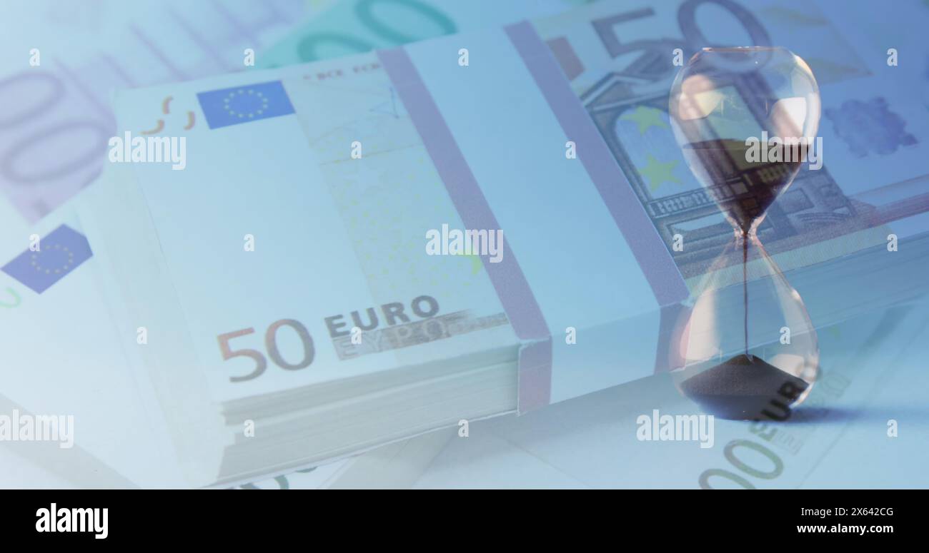 Image of euro currency banknotes over hourglass Stock Photo - Alamy