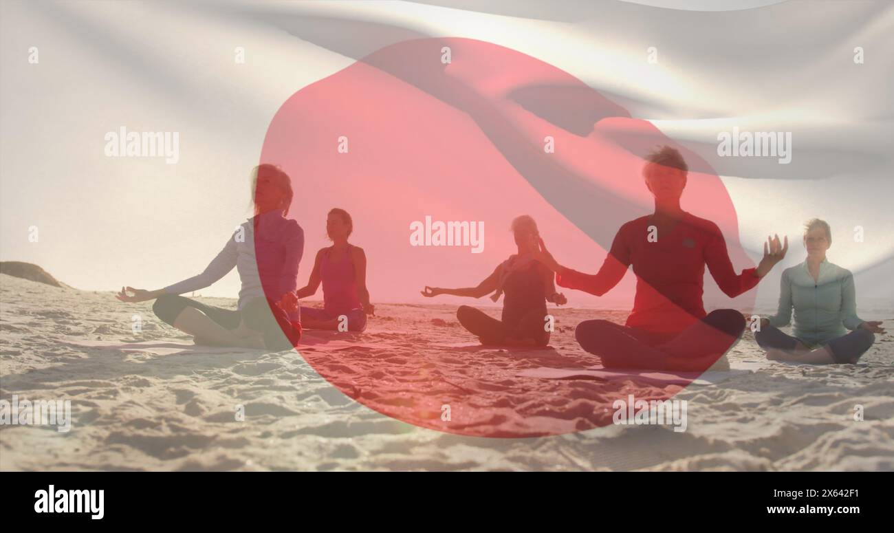 Composite image of waving japan flag against diverse group of people ...