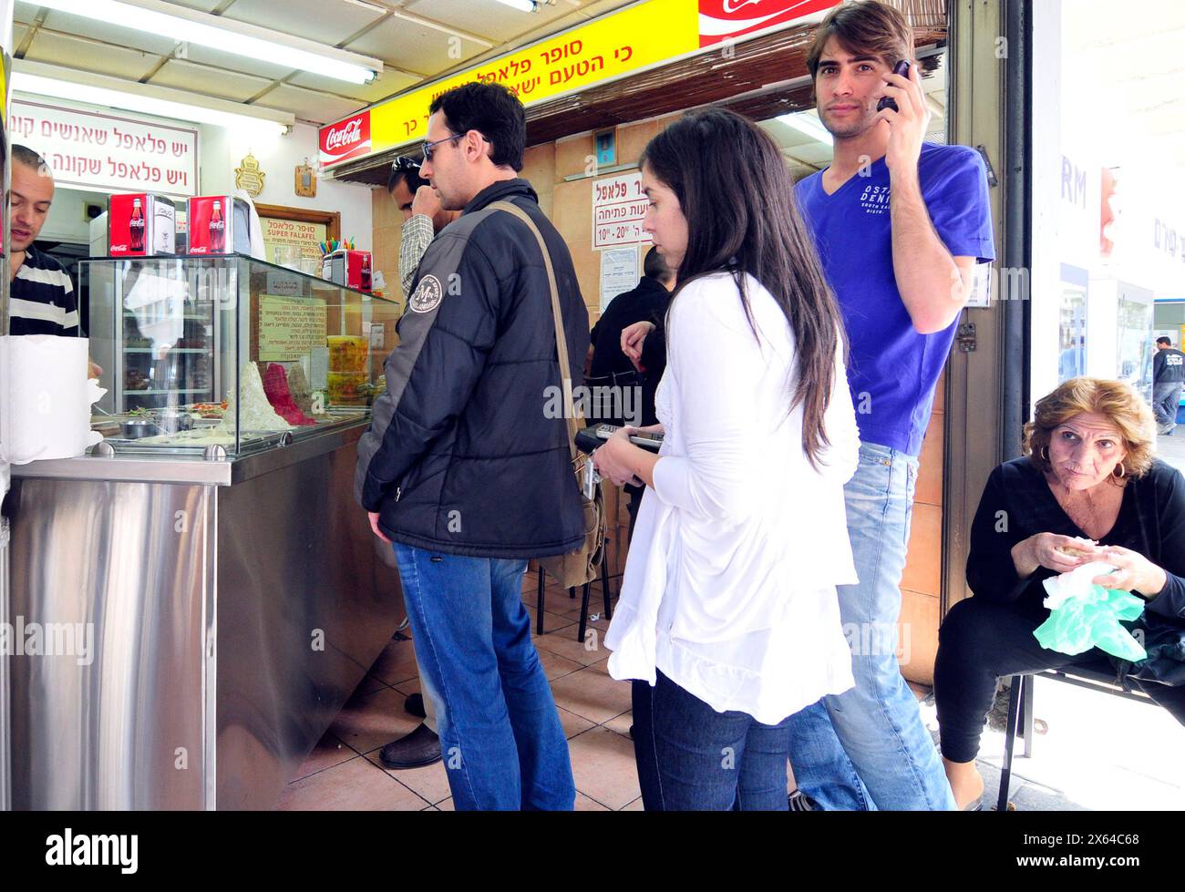 Hungry customers waiting at Super Falafel on Allenby street in Tel-Aviv ...