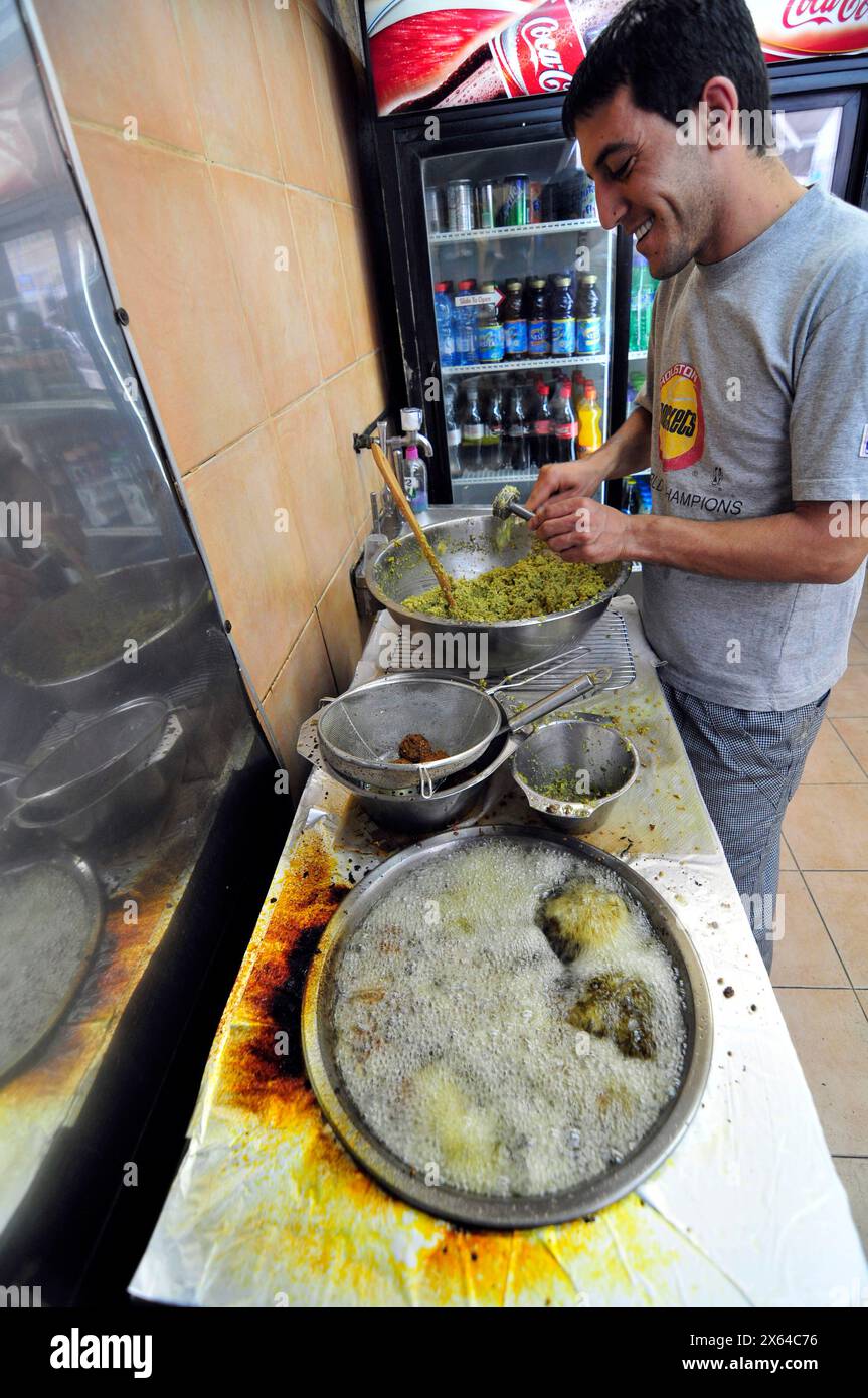 Frying Falafels at Super Falafel on Allenby street in Tel-Aviv, Israel ...