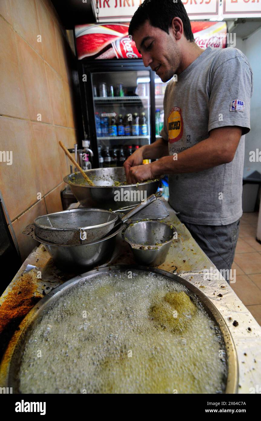 Frying Falafels at Super Falafel on Allenby street in Tel-Aviv, Israel ...