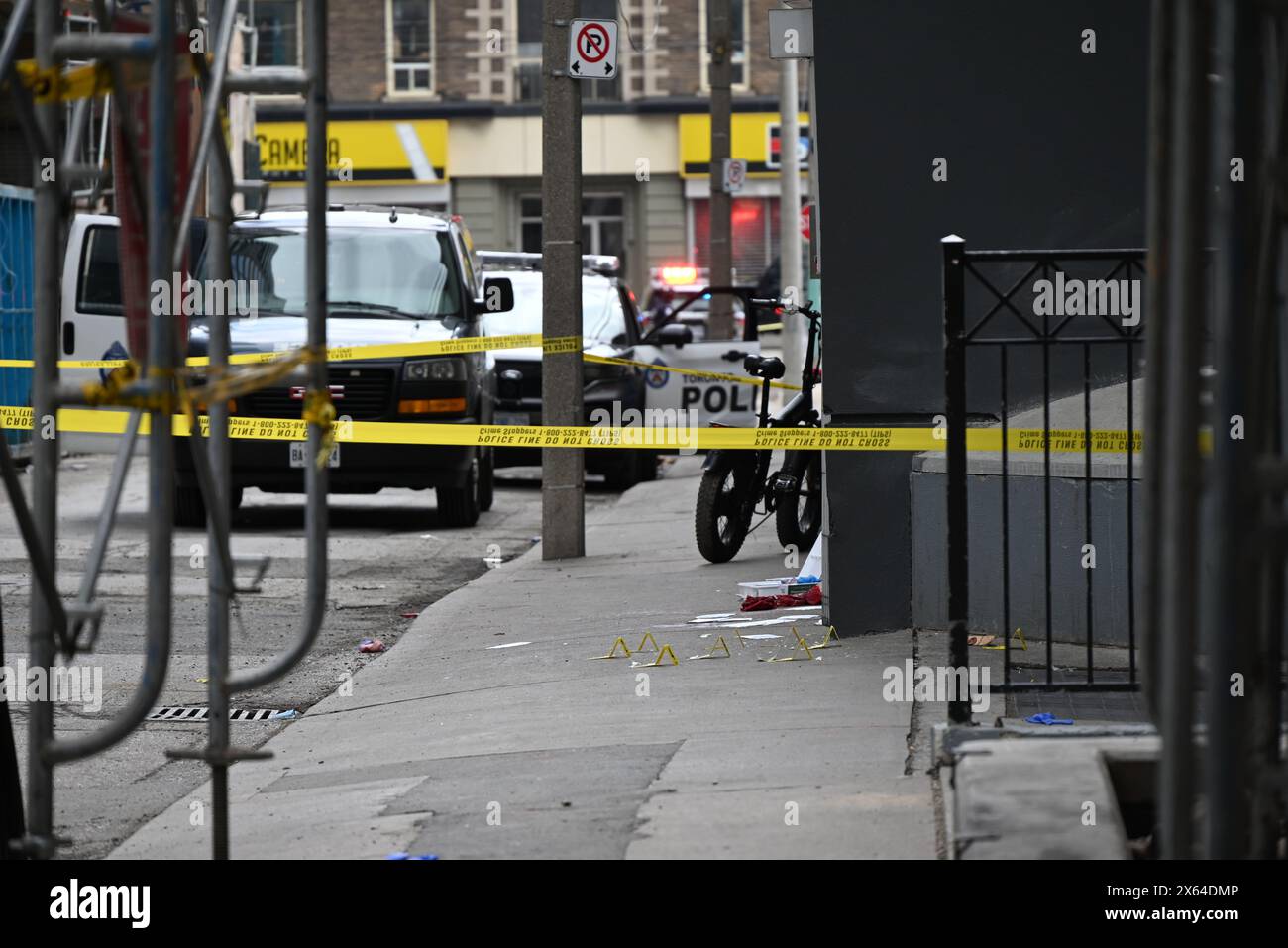 Evidence markers are at the scene of a slashing attack where evidence ...
