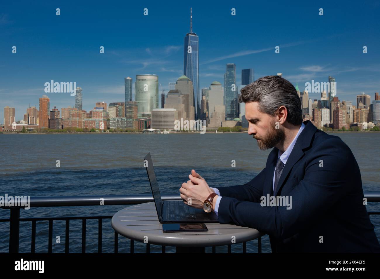 Successful us businessman. Man using laptop outdoor in New York City ...