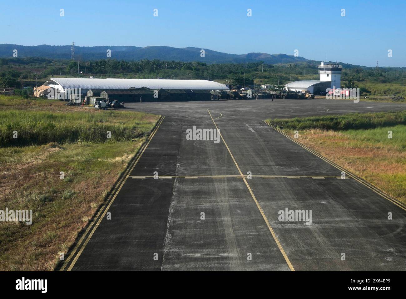 U.S. military vehicles are parked at Lal-lo airport in Lal-lo town ...