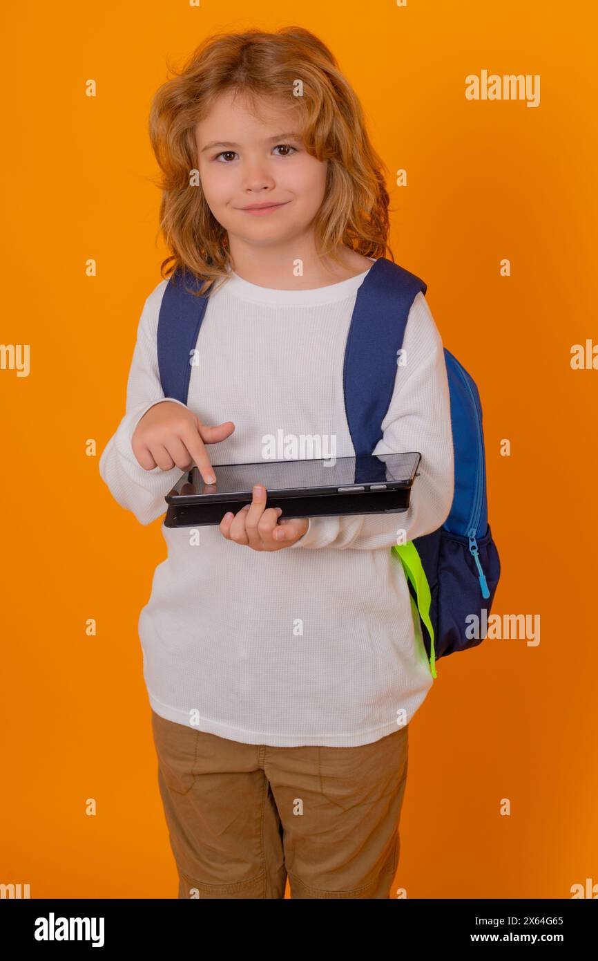 Knowledge day. Pupil schoolboy from elementary school with tablet Stock ...