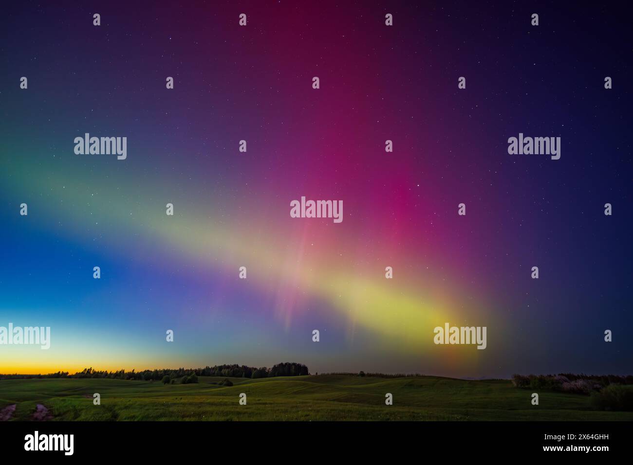 Aurora borealis is a natural light show in the sky resembling a rainbow ...