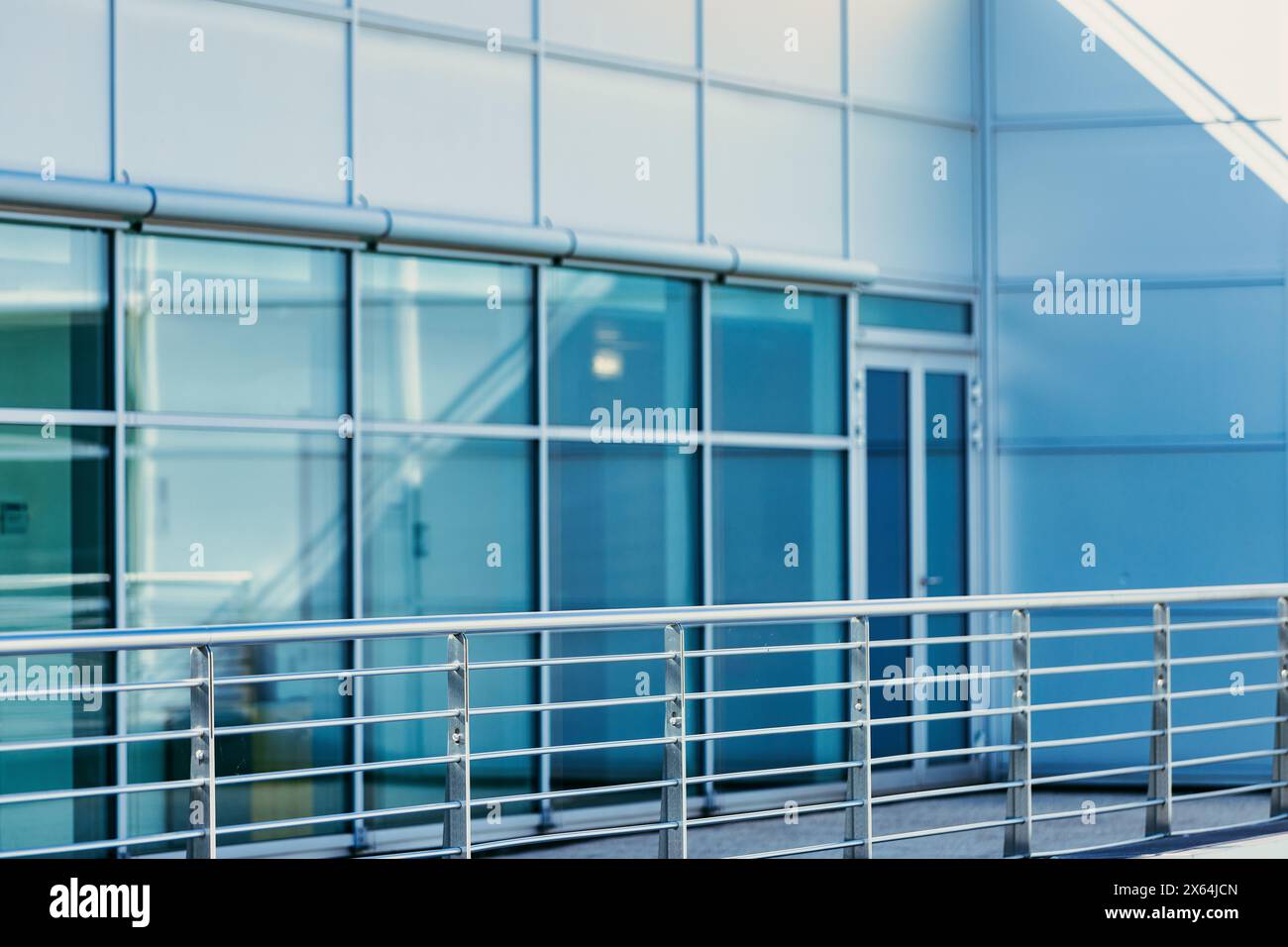 Modern architecture of an office building with reflective blue windows ...