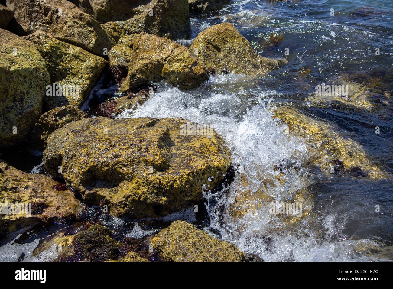 Sea waves clashing with rocks Stock Photo - Alamy