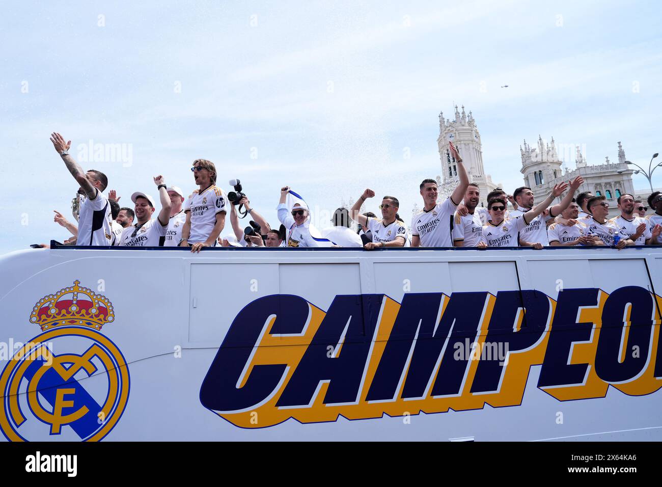 Players of Real Madrid celebrate as they arrive on a bus on the Plaza ...