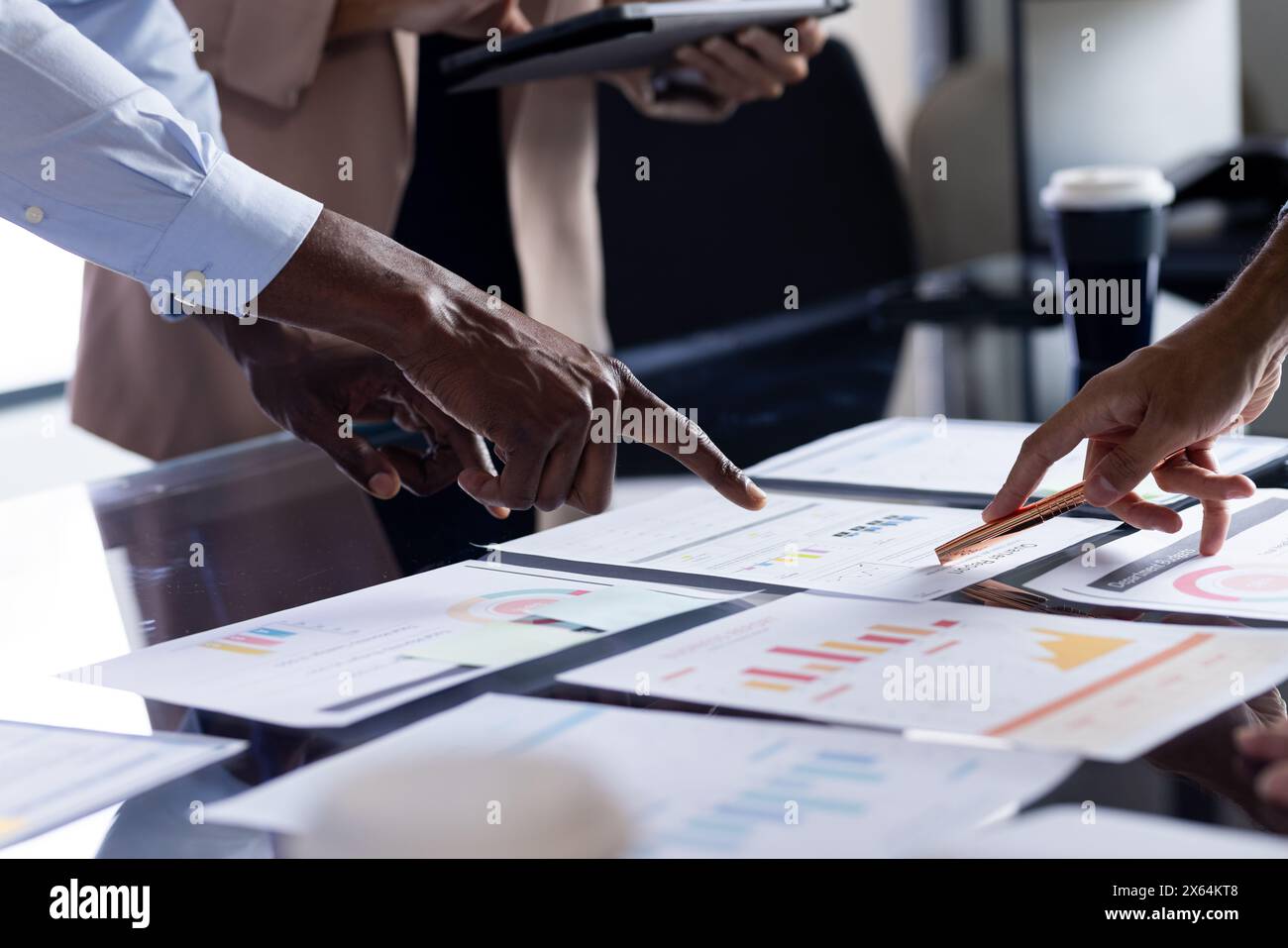 Man woman reviewing papers desk hi-res stock photography and images - Alamy
