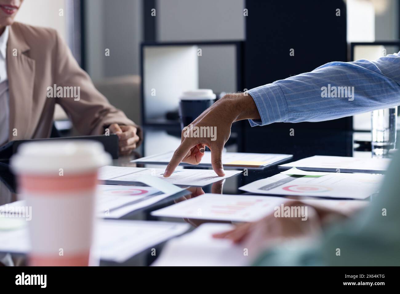 Senior woman reviewing business papers hi-res stock photography and ...