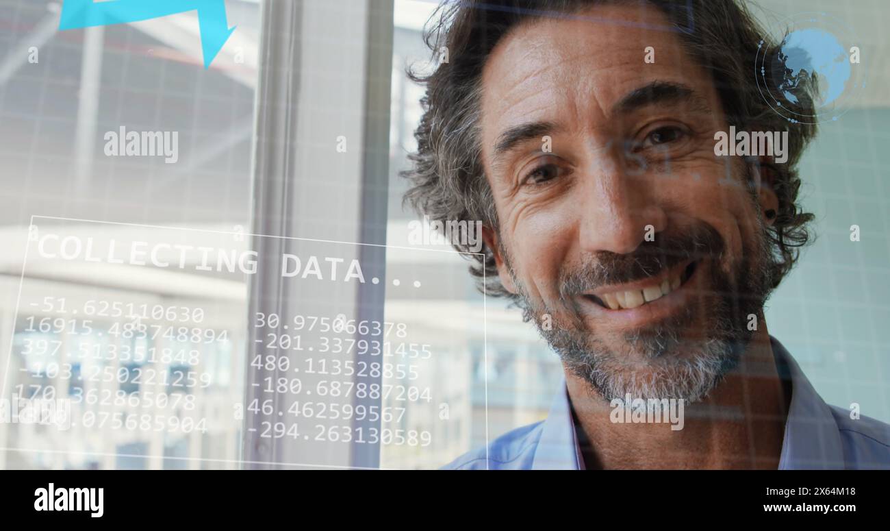Image Of Statistical Data Processing Against Portrait Of Caucasian Man Smiling At Office Stock