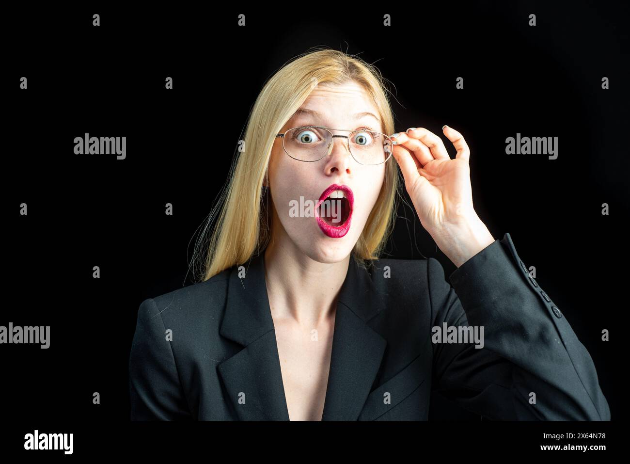 Shocked Secretary in glasses deluged by documents. Thoughtful young ...