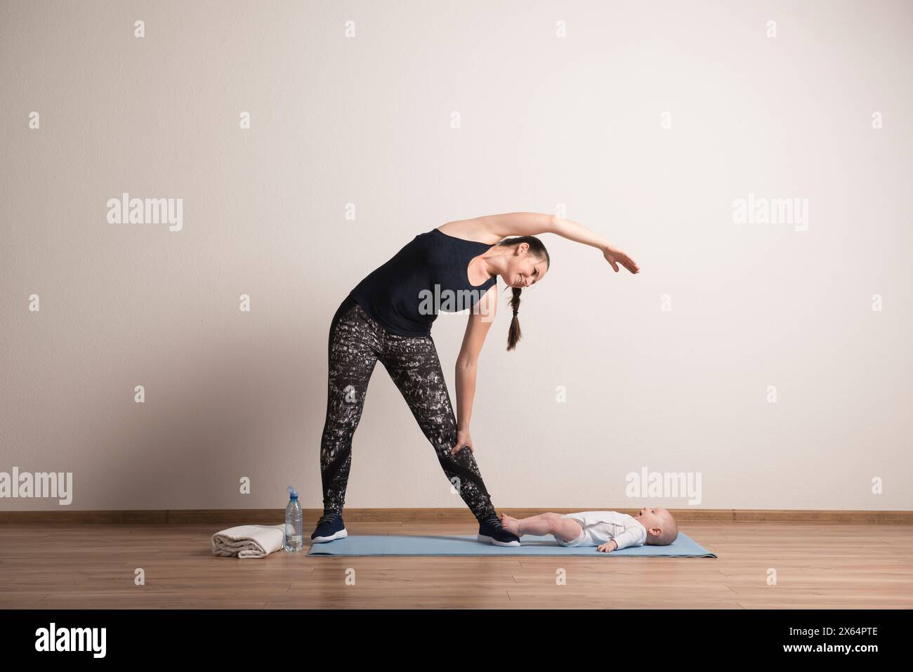 Home exercise for mother and baby, mommy and me workout. Physical ...