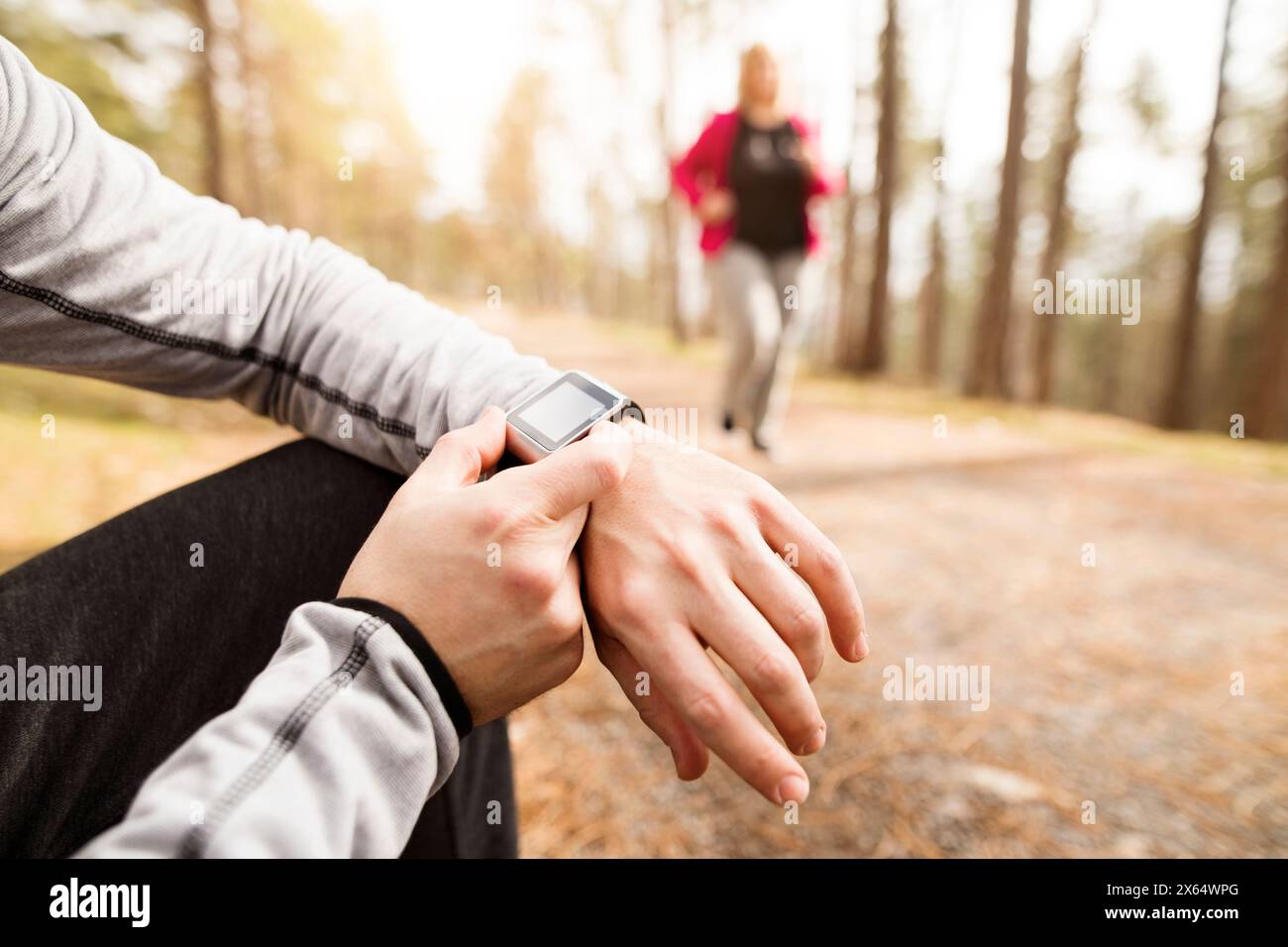 Close up of overweight woman running down the stairs, personal trainer ...