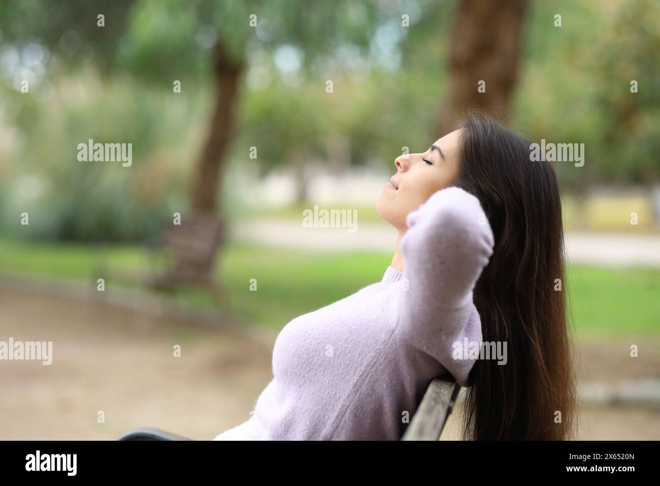 Woman resting head on hands hi-res stock photography and images - Alamy