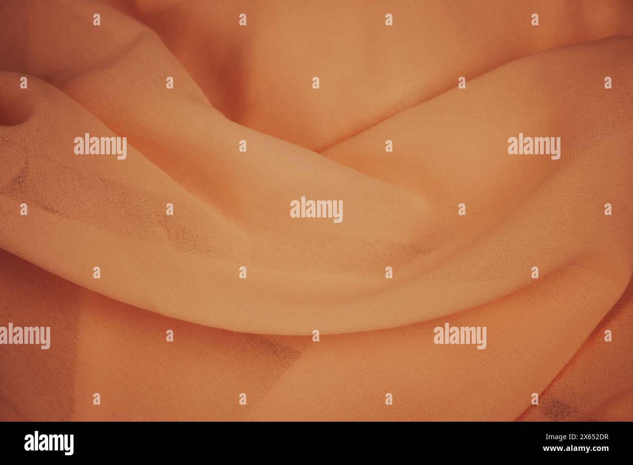 Peach fuzz colour background. Apricot colour pattern. Chiffon fabric ...