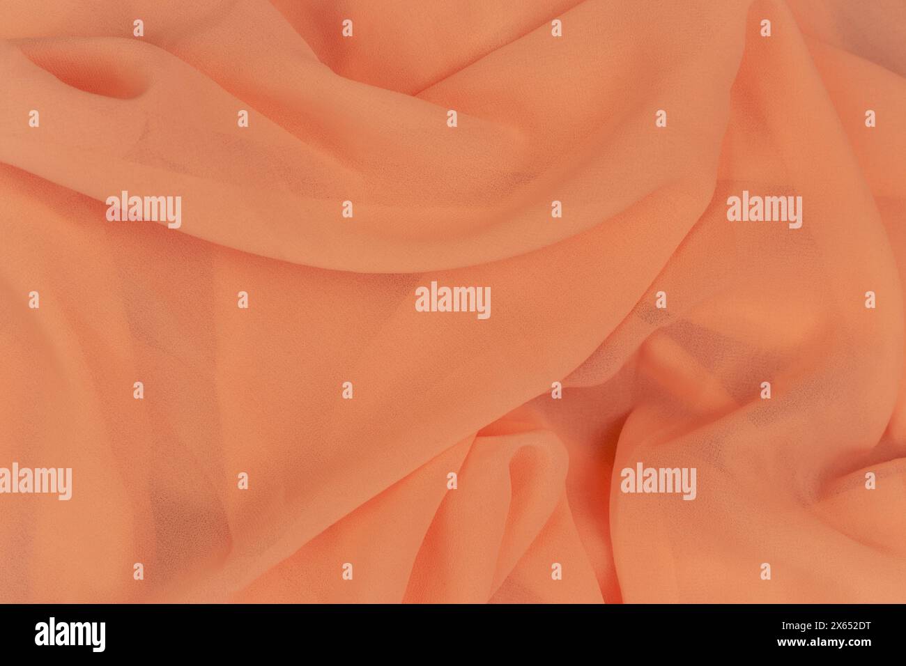 Peach fuzz colour background. Apricot colour pattern. Chiffon fabric ...