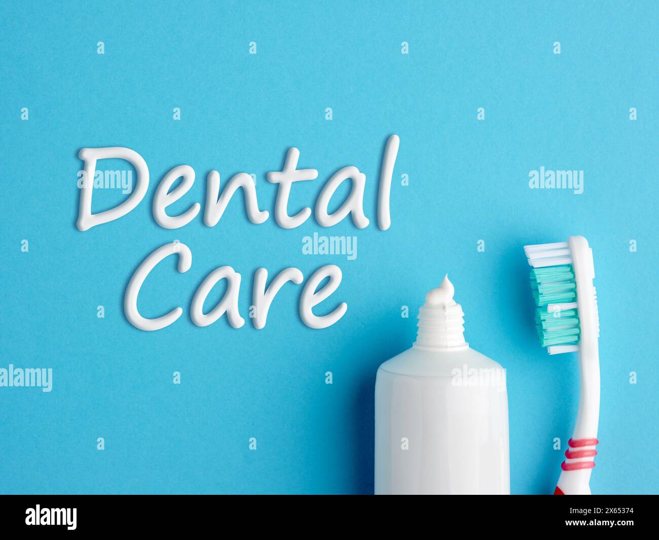 The word Dental Care written with toothpaste on blue background. Dental ...
