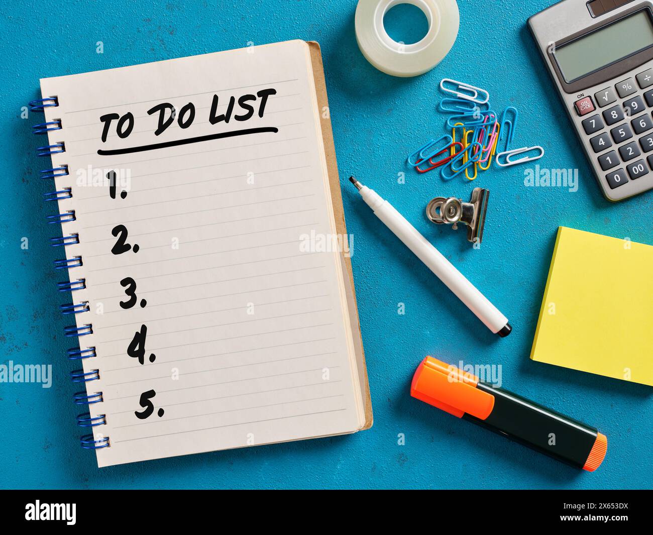 Handwritten to do list on a notebook. Checklist of tasks to complete ...