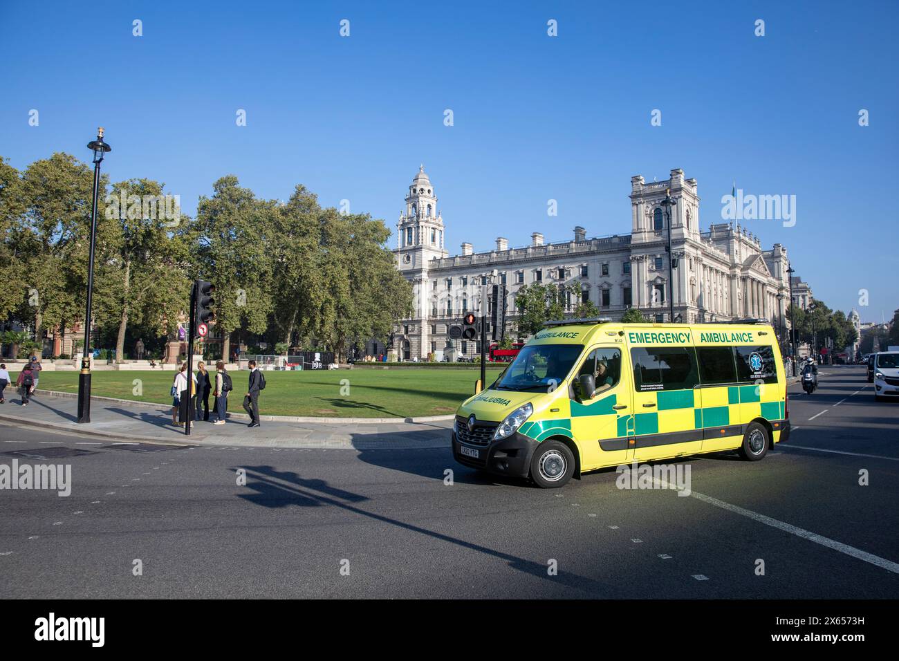 London, NHS ambulance travelling around Parliament Square in ...