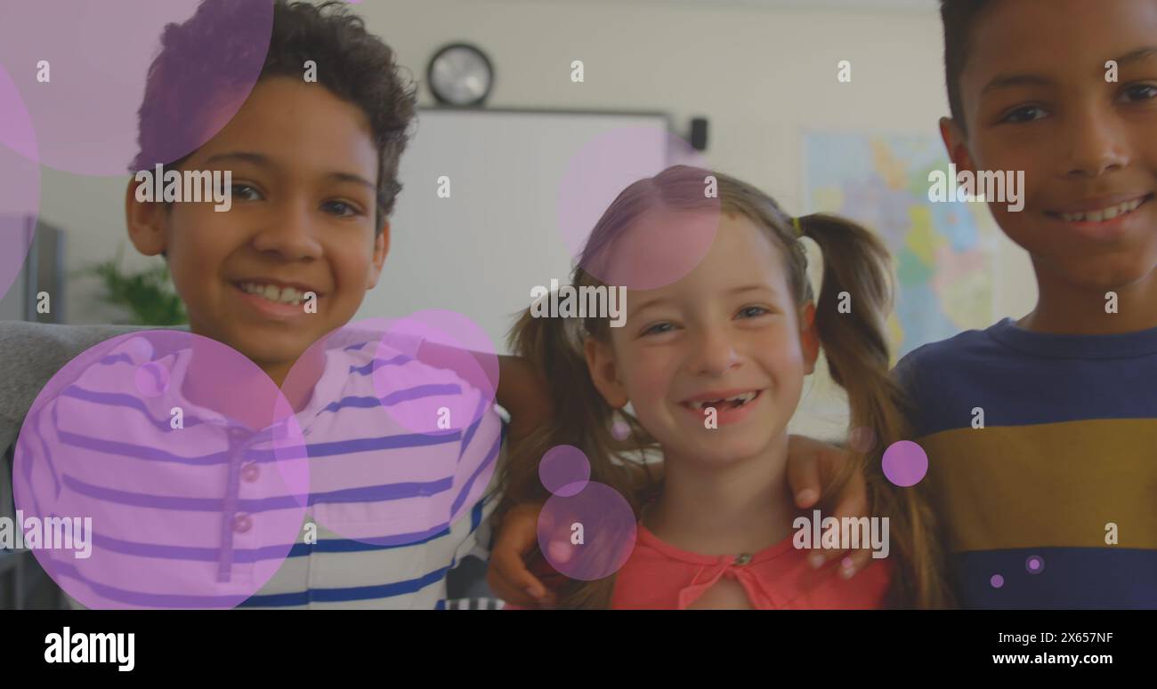 Image of spots of pink light over diverse school children Stock Photo ...