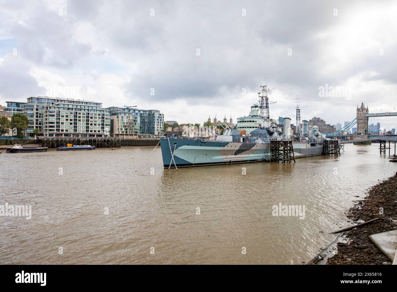HMS Belfast museum ship and tourist attraction is permanently moored on ...