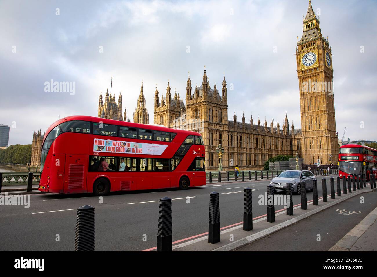 Westminster Bridge London, two red double decker London buses on the ...