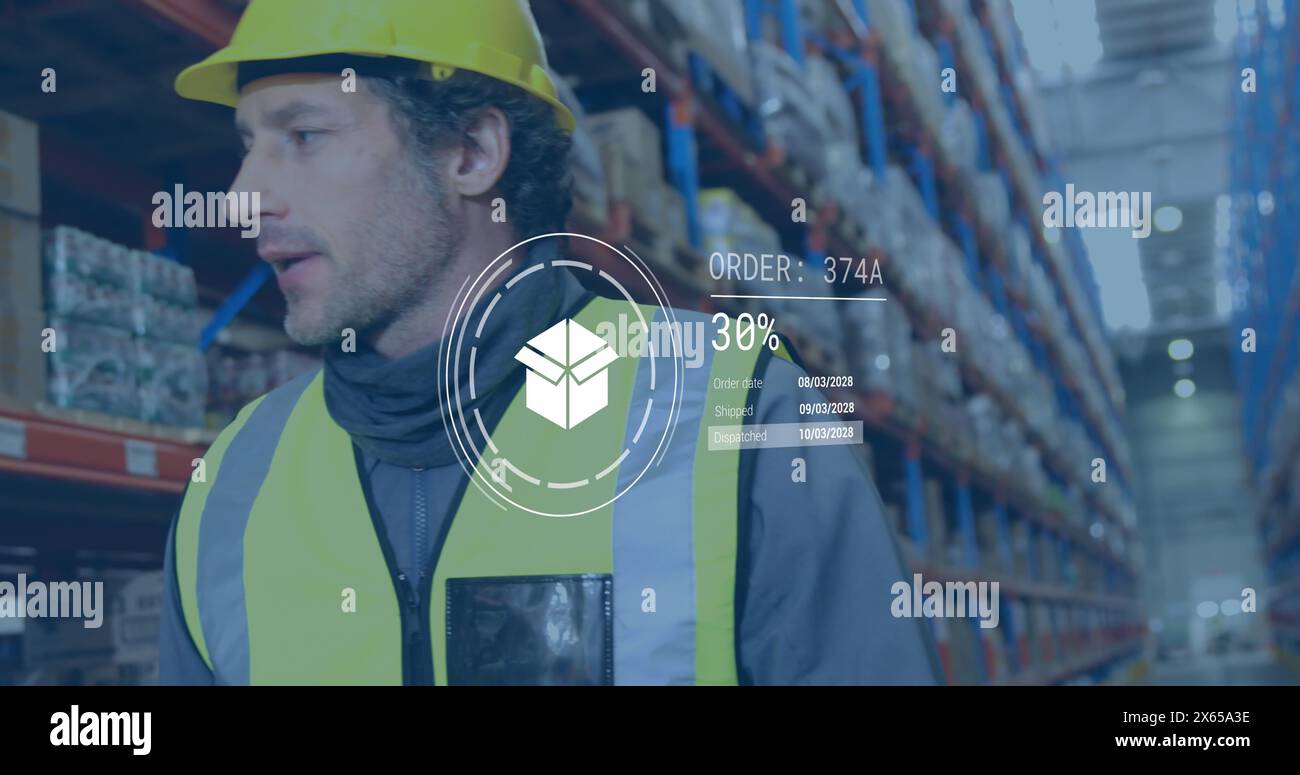 Caucasian male worker wearing yellow hard hat, checking orders ...
