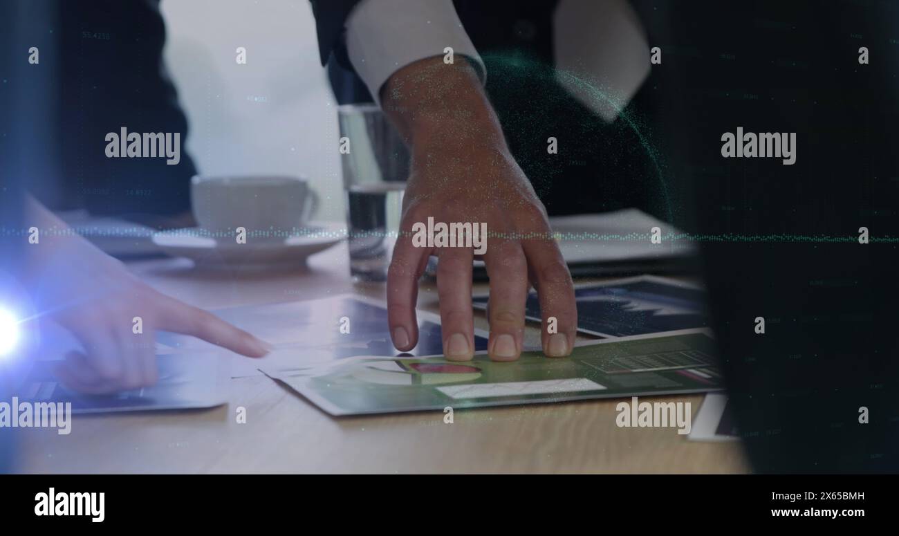 Image of caucasian woman pointing safe over two laptop screen with ...