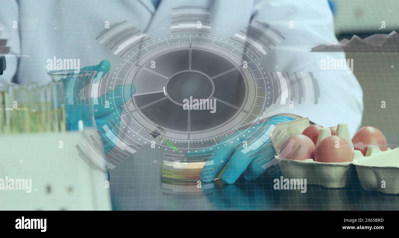 Image of scope scanning and data processing over laptop Stock Photo - Alamy