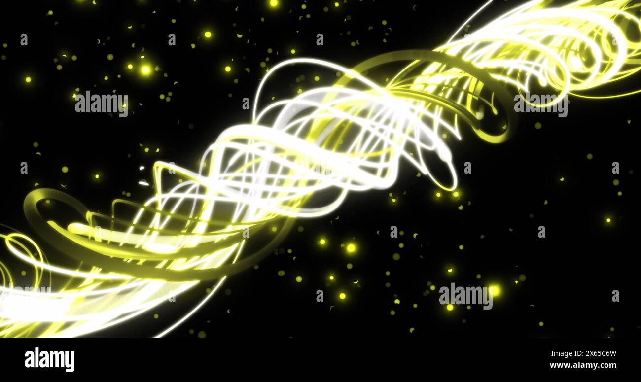 Image of flashing yellow lights and light trails moving on black ...