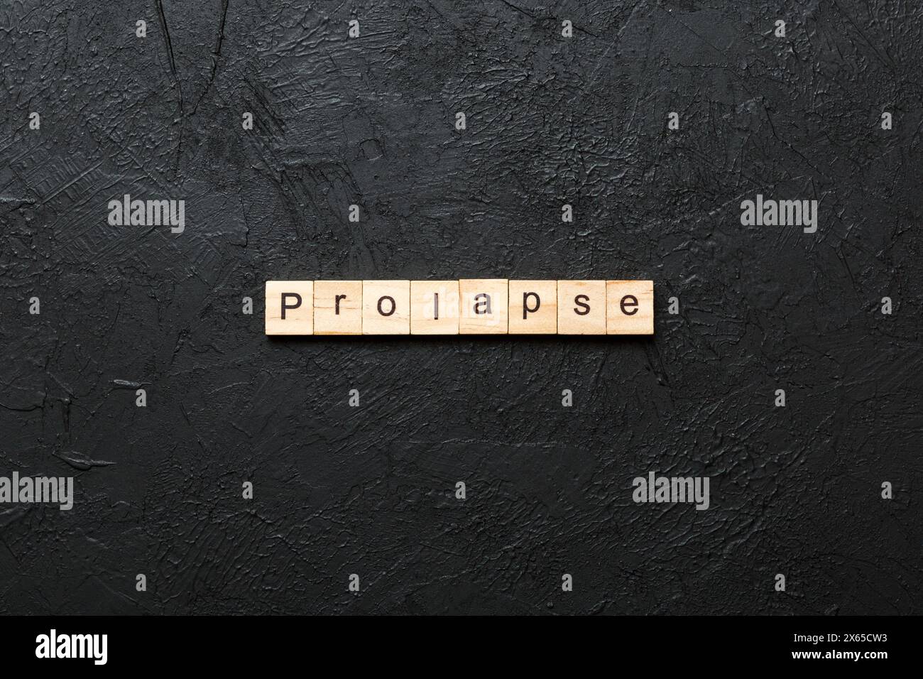 prolapse word written on wood block. prolapse text on table, concept ...