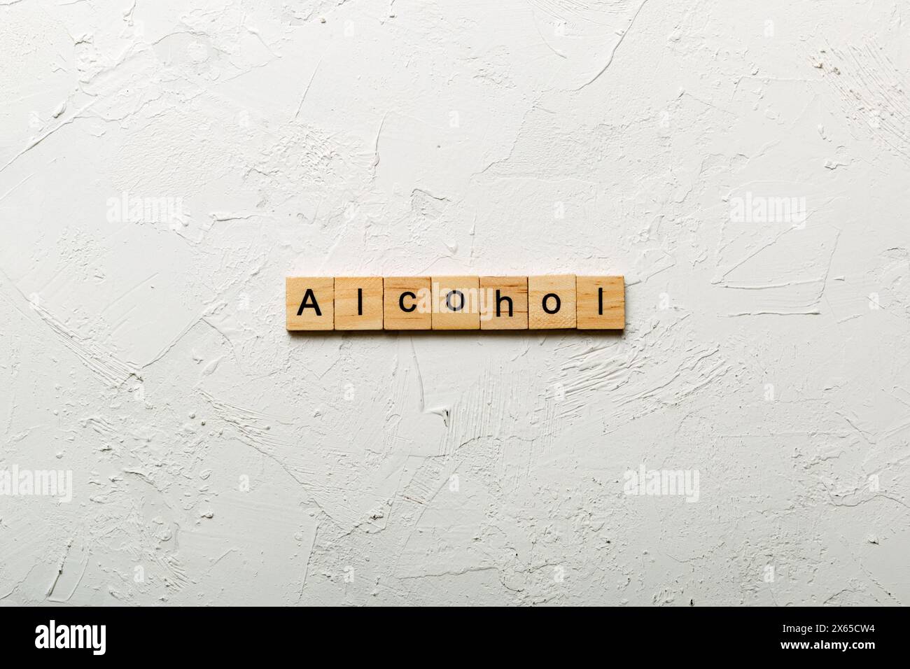 alcohol word written on wood block. alcohol text on table, concept ...