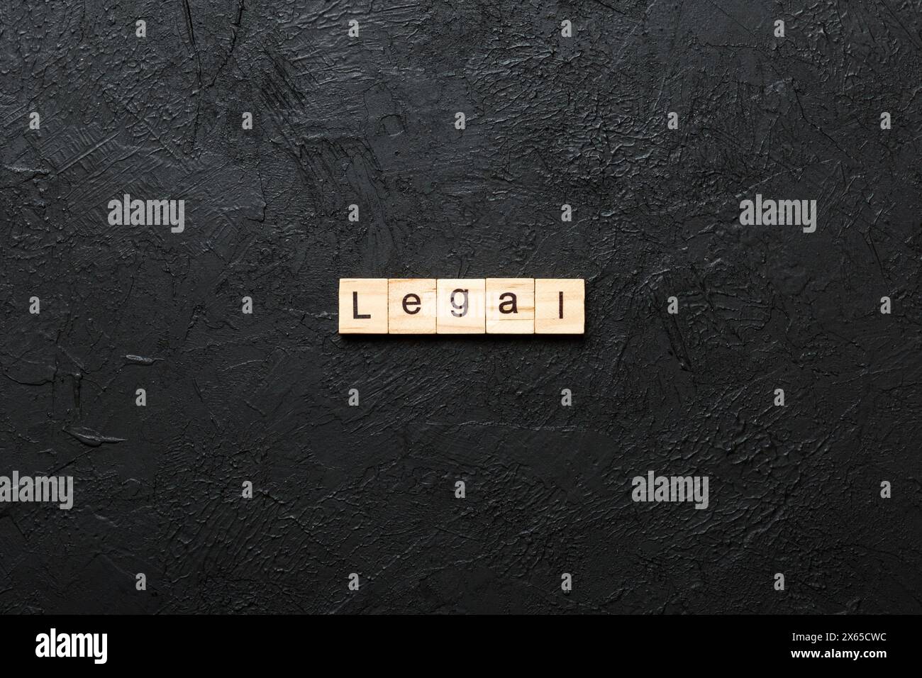 legal word written on wood block. legal text on table, concept Stock ...