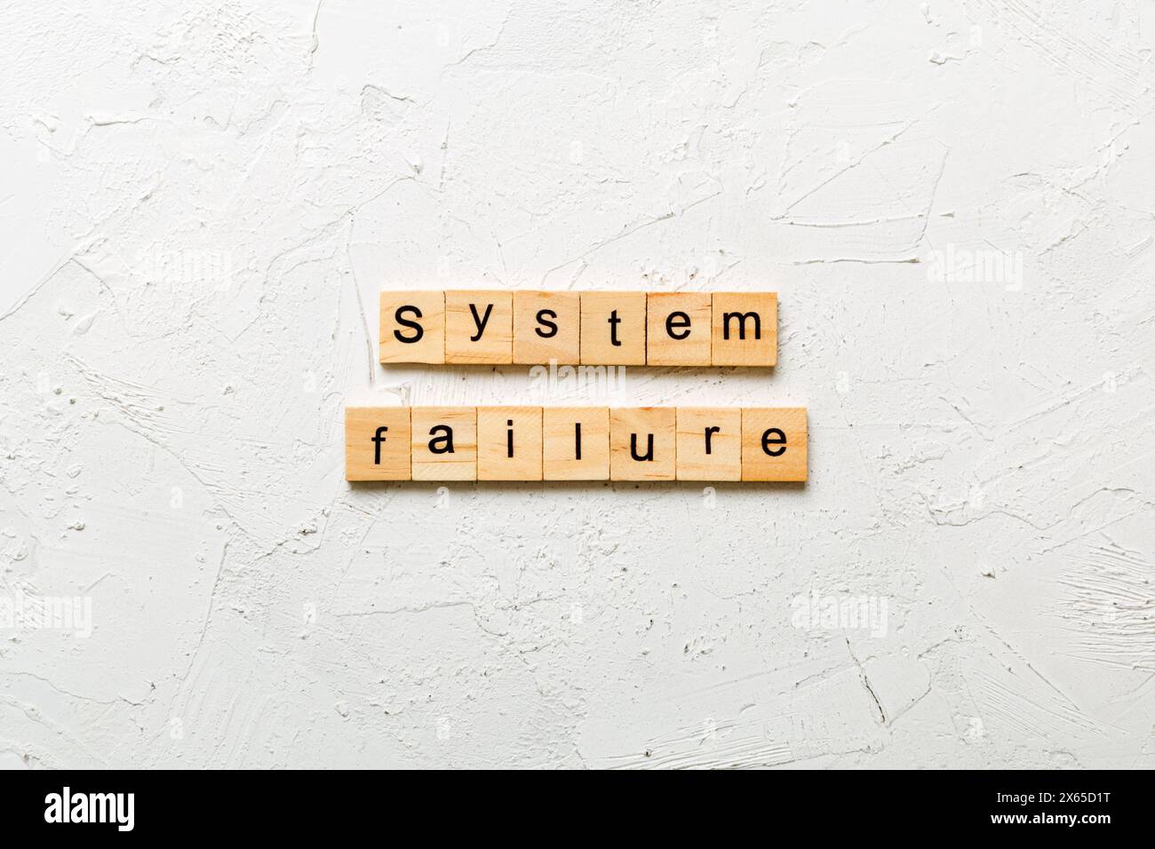 system failure word written on wood block. system failure text on table ...