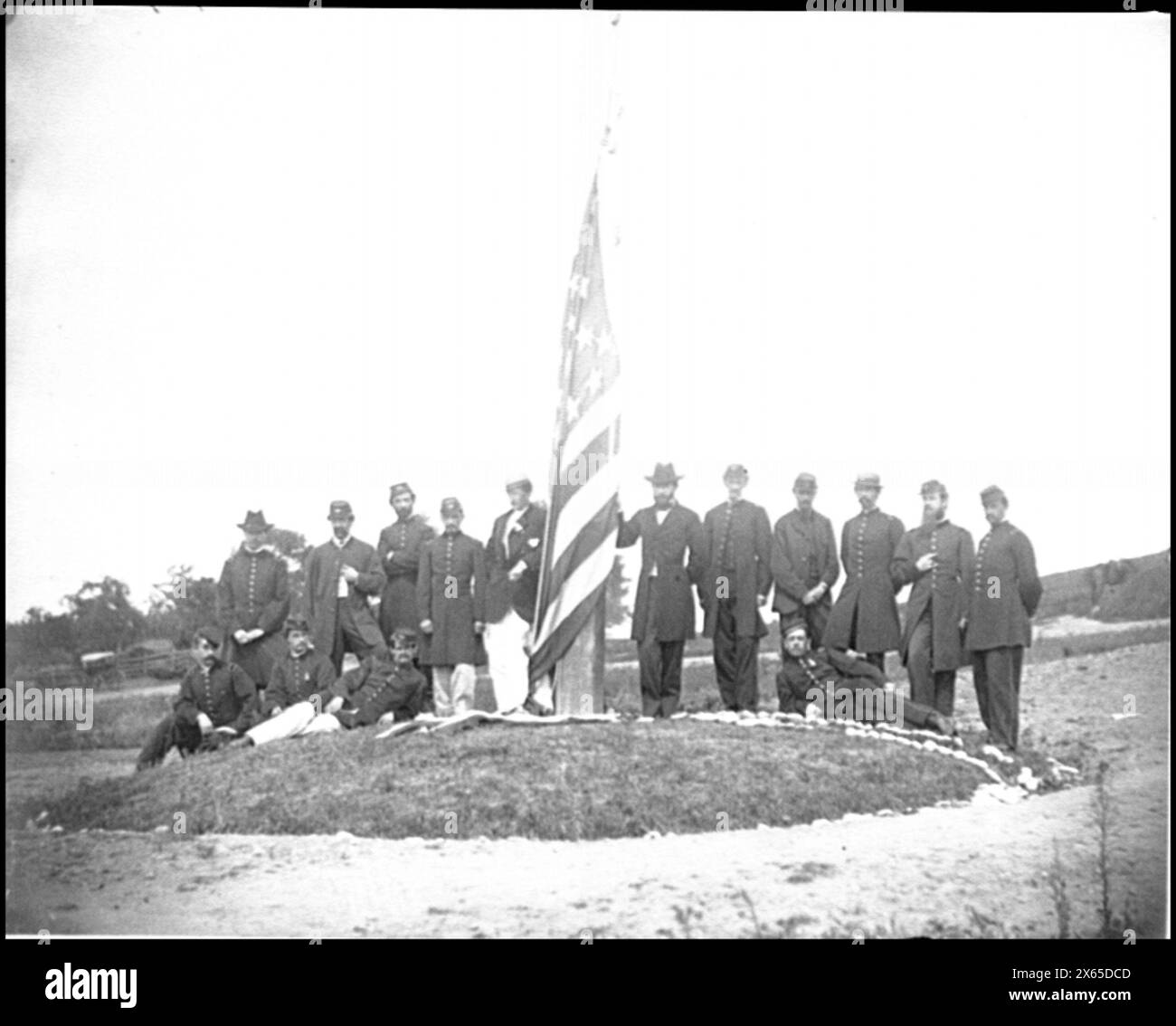 Washington, D.C. Signal Corps officers lowering flag at their camp near ...