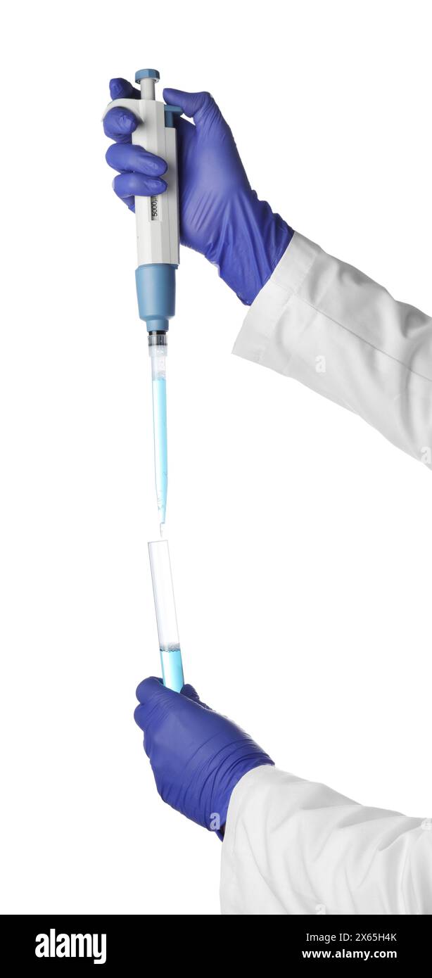 Laboratory analysis. Scientist dripping sample with micropipette into ...