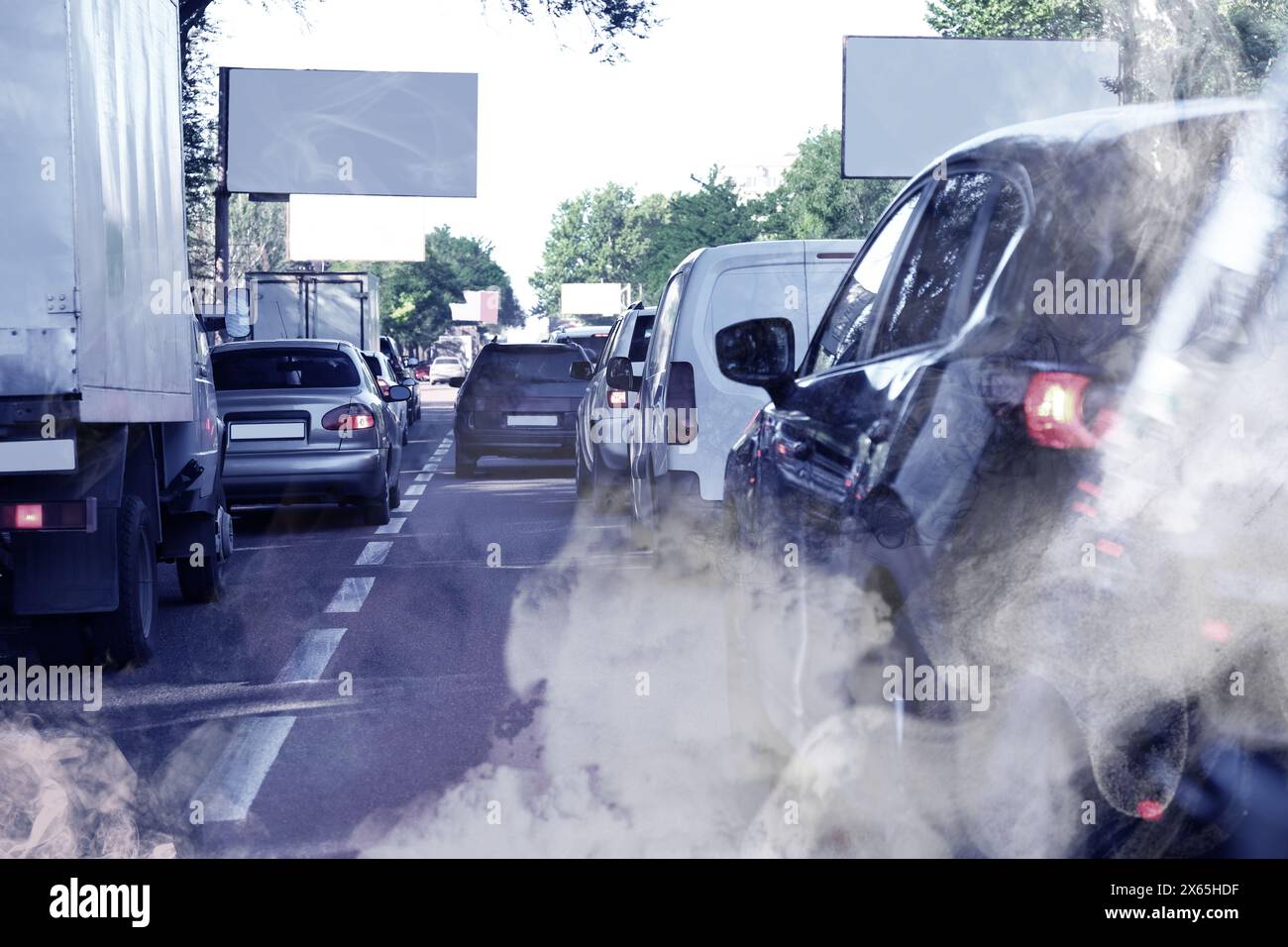 Environmental pollution. Air contaminated with fumes in city. Cars ...