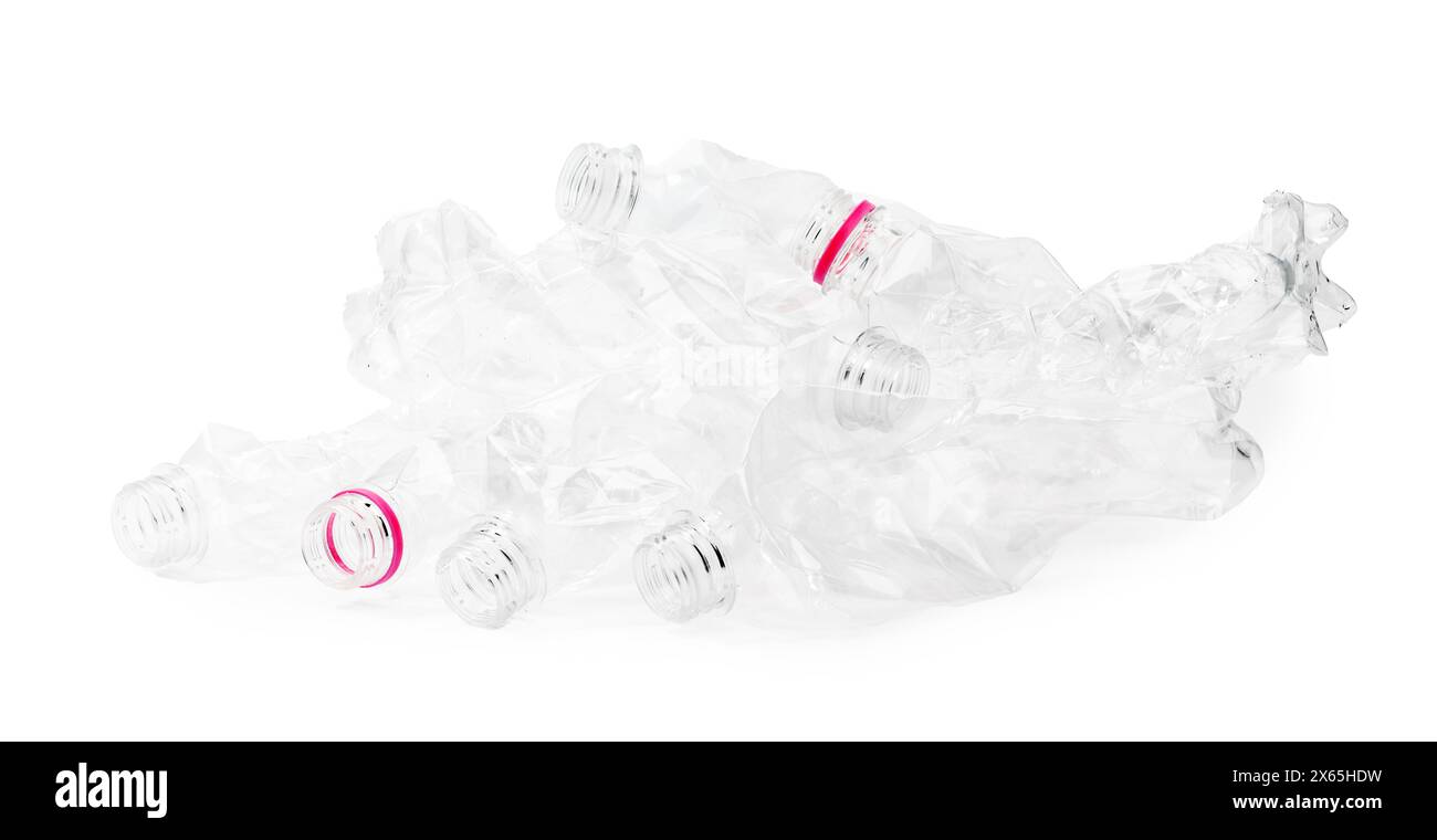 Crumpled disposable plastic bottles on white background Stock Photo - Alamy