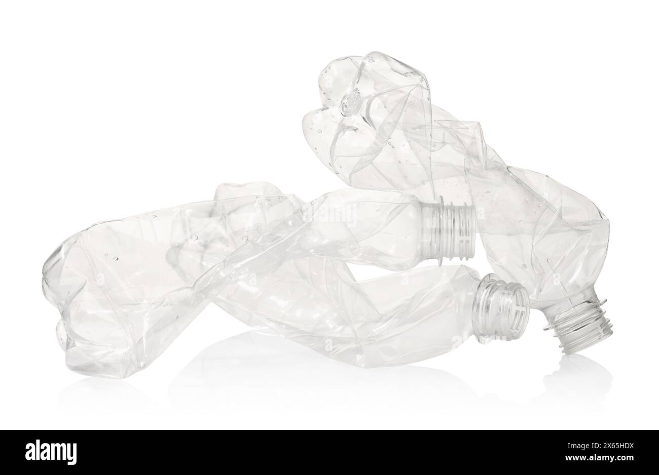 Crumpled disposable plastic bottles isolated on white Stock Photo - Alamy