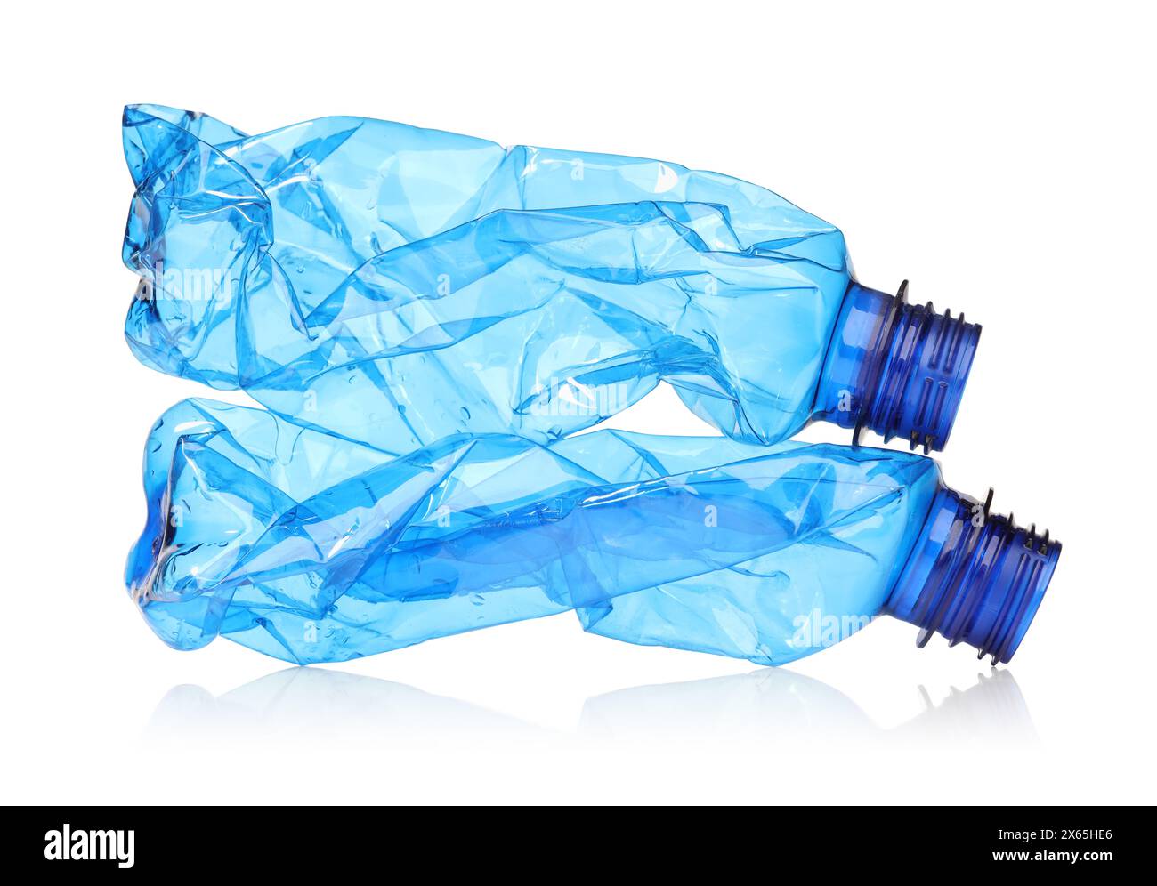 Crumpled disposable plastic bottles isolated on white Stock Photo - Alamy