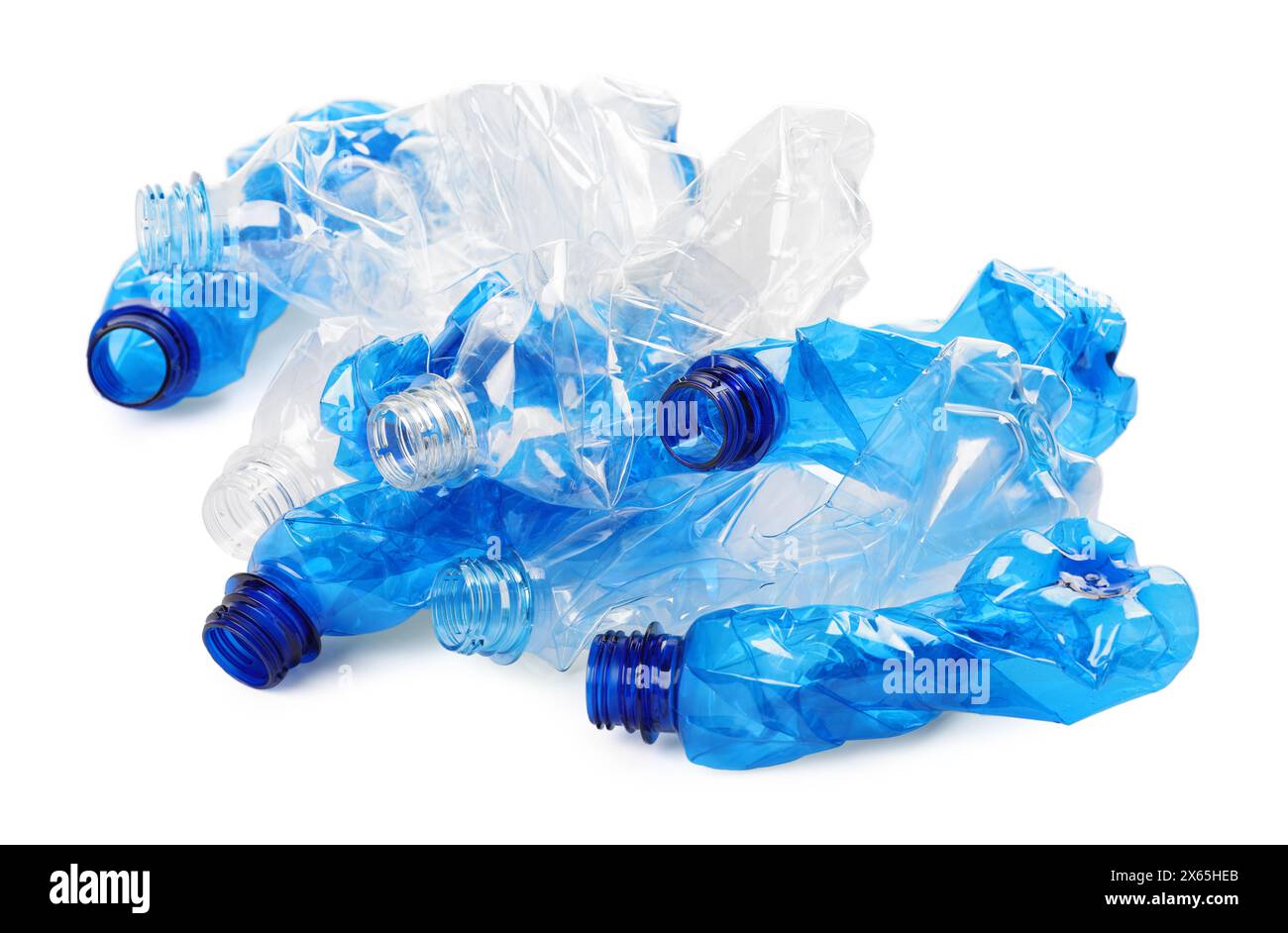 Crumpled disposable plastic bottles on white background Stock Photo - Alamy